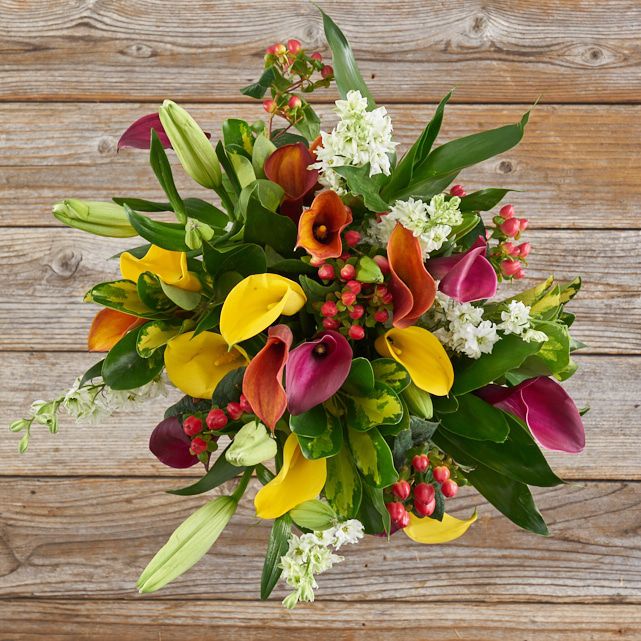 Yellow Calla Lily and Silver Bell Arrangement - The Bouqs Co.