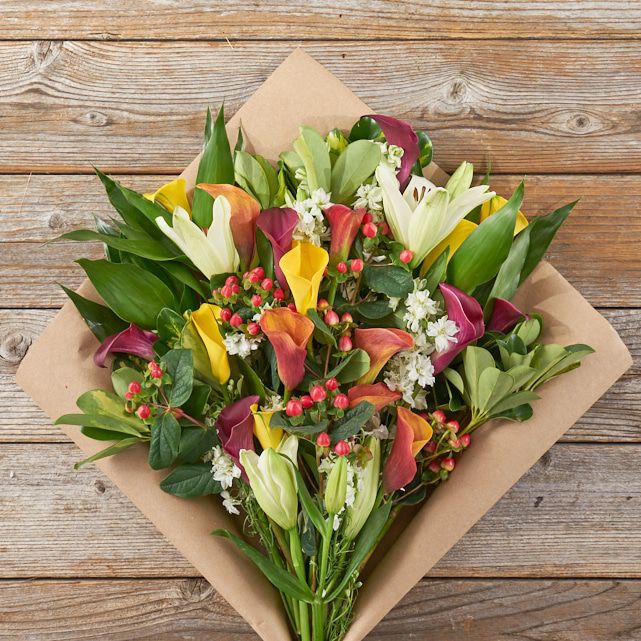 Yellow Calla Lily and Silver Bell Arrangement - The Bouqs Co.