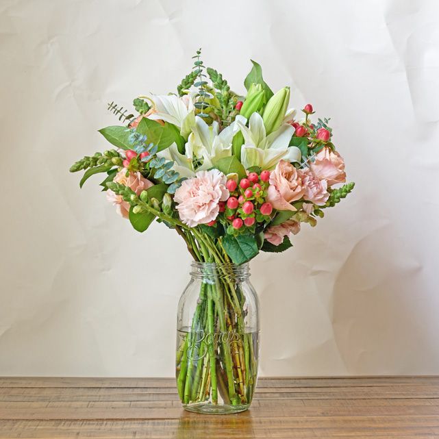 Peach Carnations White Hybrids And Rose Arrangement The Bouqs Co