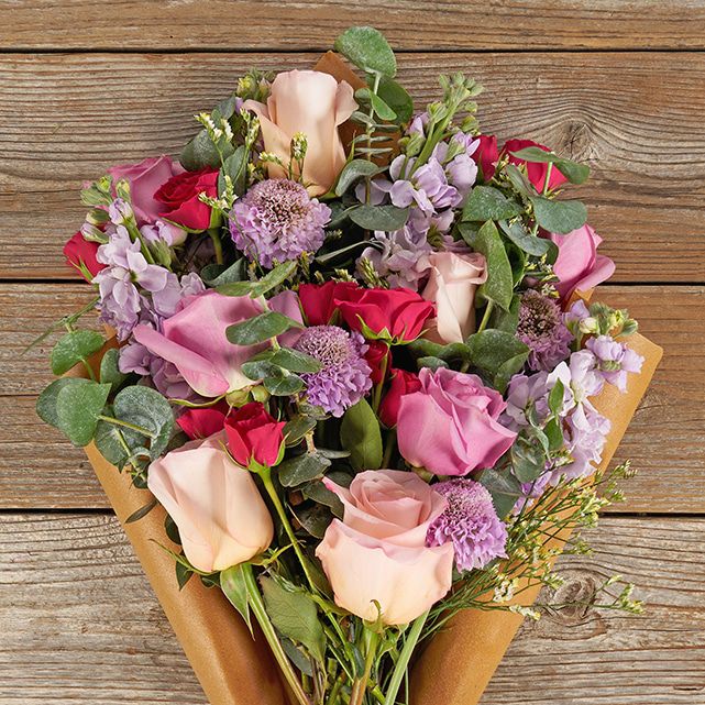 Pink, Lavender, and Light Pink Roses and Scabiosa. - The Bouqs Co.