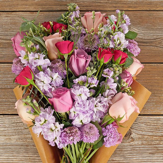 Pink, Lavender, and Light Pink Roses and Scabiosa. - The Bouqs Co.